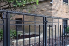 Apartment Building Railing with Loafer Top - Compass Ironworks